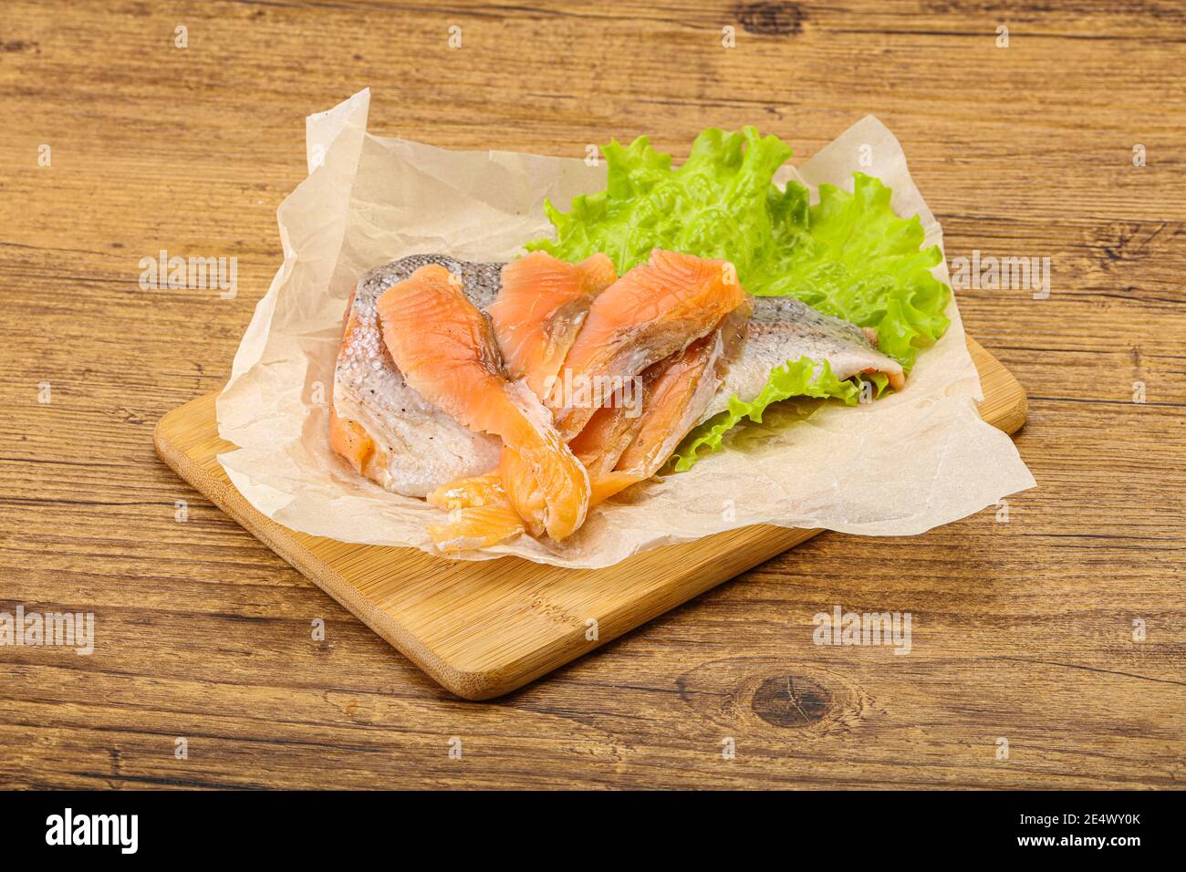 Sliced natural wild trout fillet over board Stock Photo - Alamy