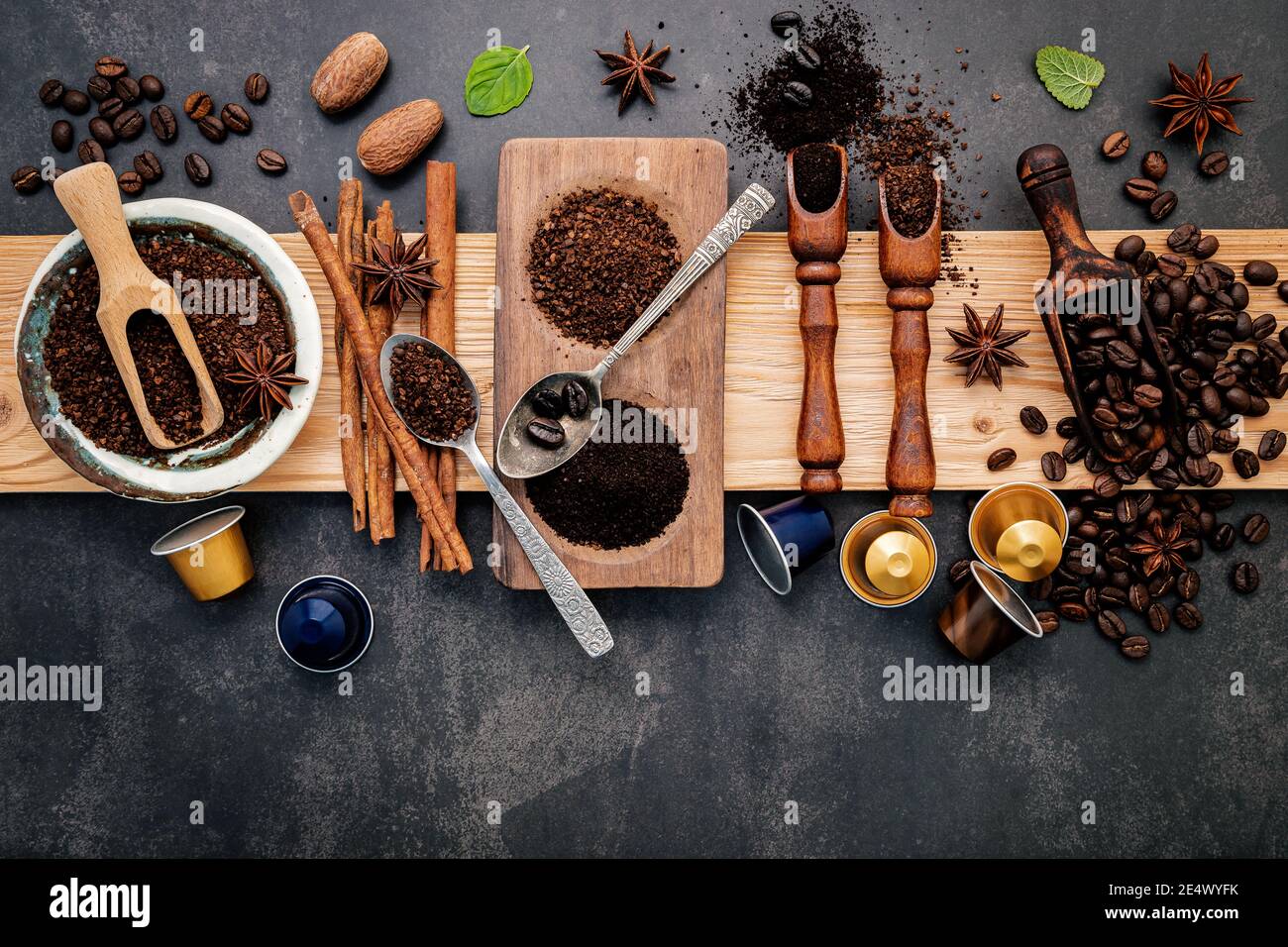 Roasted coffee beans with coffee powder and flavourful ingredients for ...