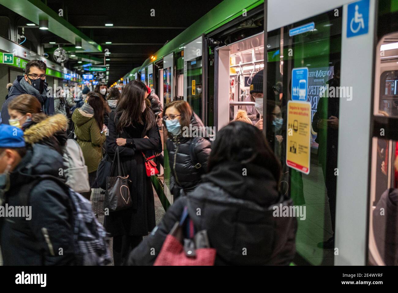 Milan, Italy. 25th Jan, 2021. Milan, Orange Zone, People on the subway ...