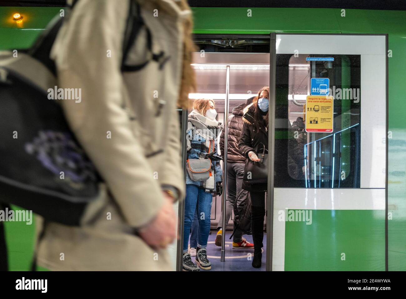Milan, Italy. 25th Jan, 2021. Milan, Orange Zone, People on the subway ...