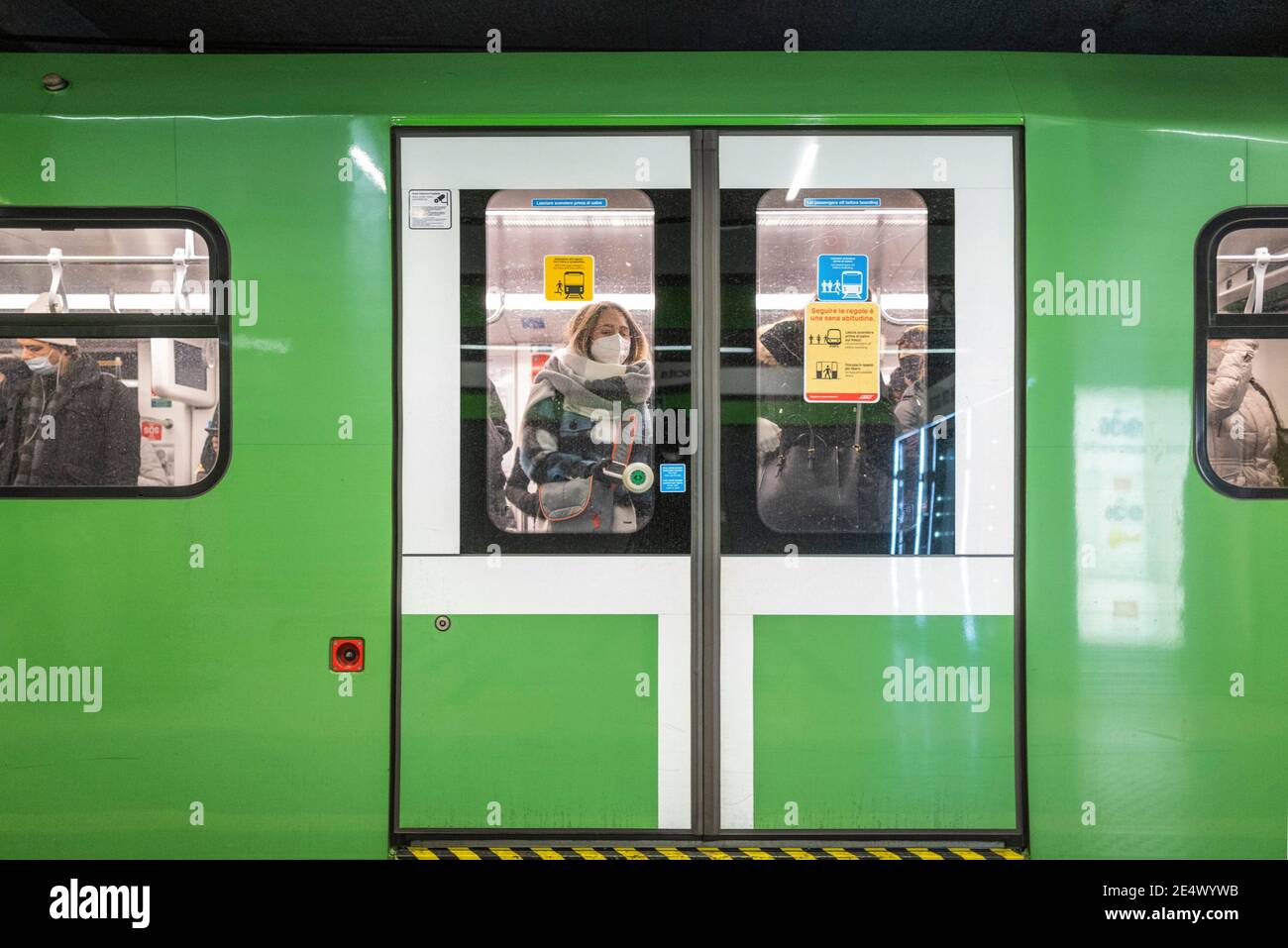 Milan, Italy. 25th Jan, 2021. Milan, Orange Zone, People on the subway ...