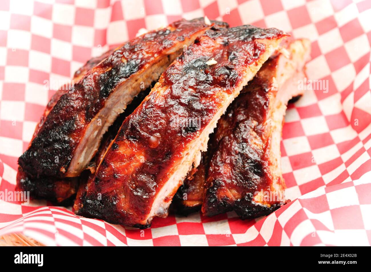 pork bbq ribs smothered with bbq sauce Stock Photo - Alamy