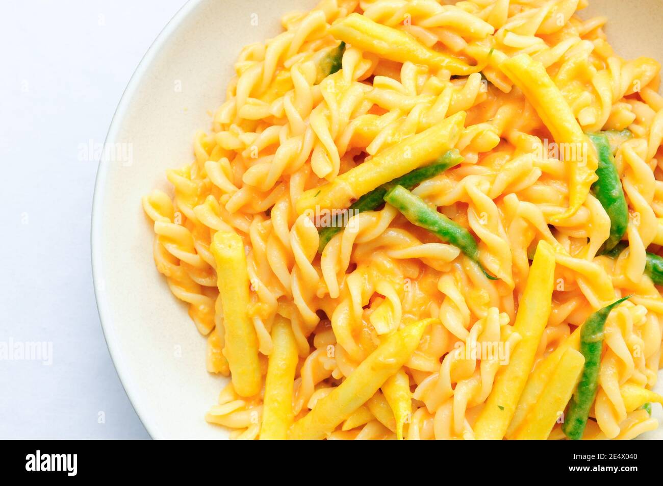 vegetarian pasta fusilli with a creamy tomato sauce and fresh ga Stock ...