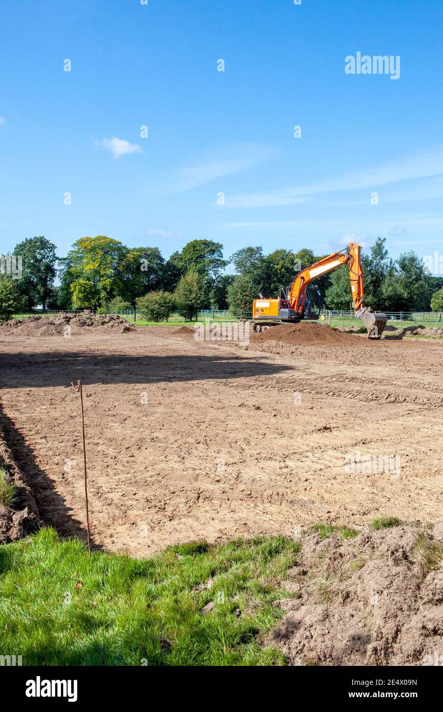 Construction of a horse riding arena Stock Photo - Alamy