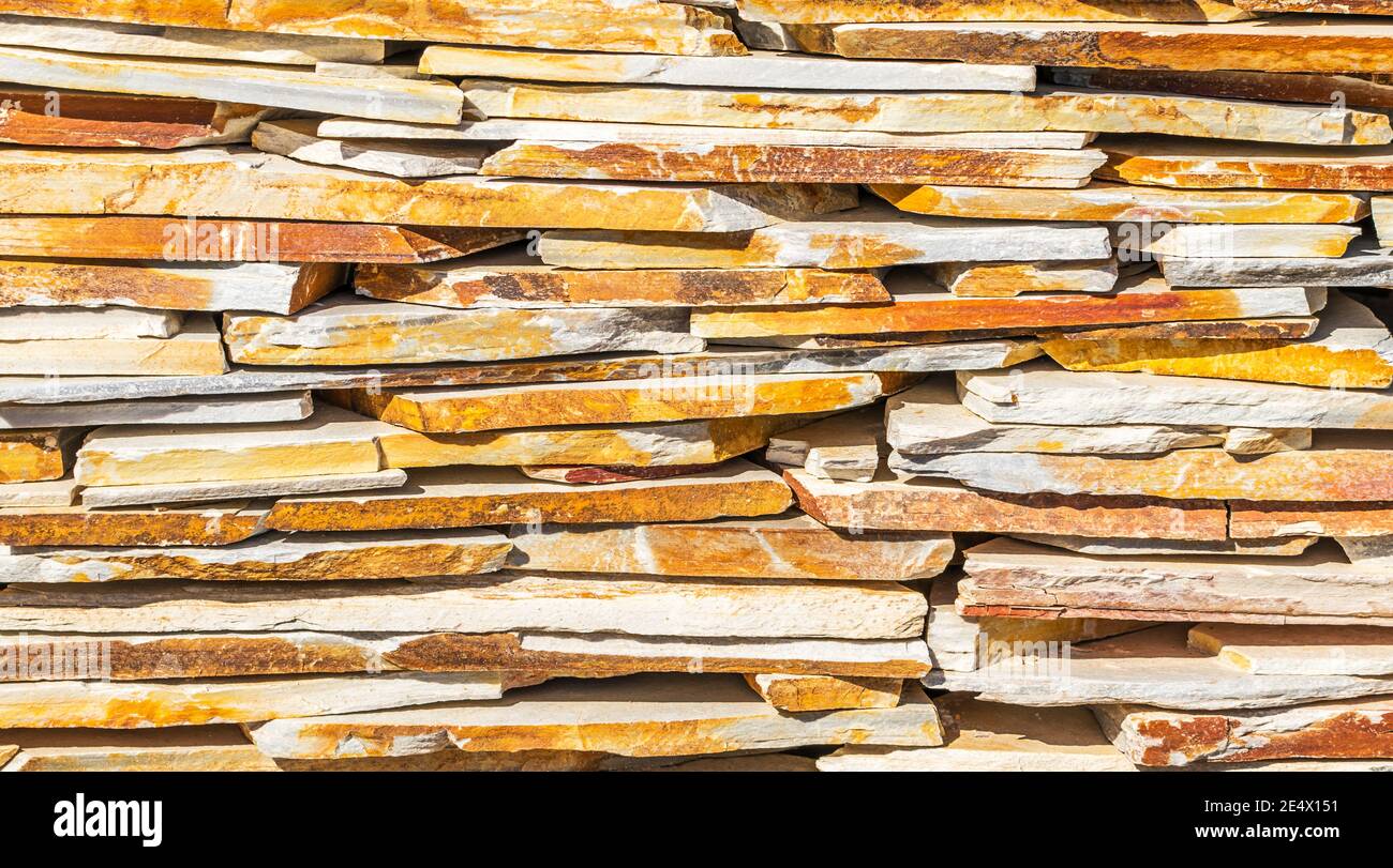 Closeup shot of yellow rock wall Stock Photo - Alamy