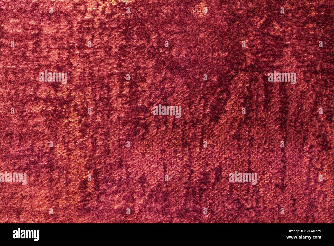 Dark red and purple fluffy background of soft, fleecy fabric. Texture ...