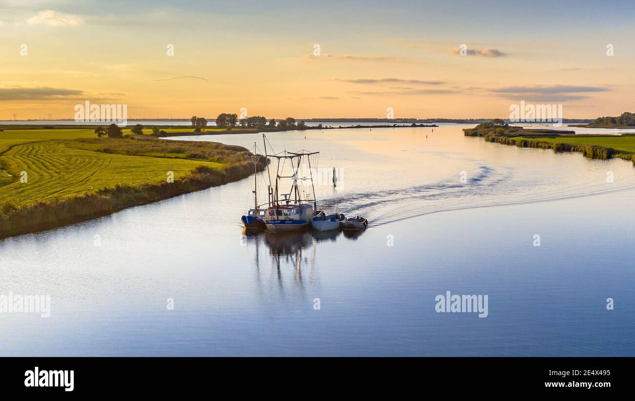Aerial view of Zwarte Water river near IJsselmeer with fishing ship ...