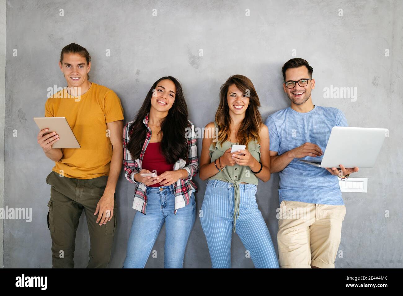 Group of happy friends, people smiling and connected by digital devices ...