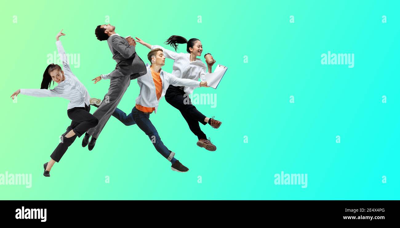 Fluid. Happy office workers jumping and dancing in casual clothes or ...