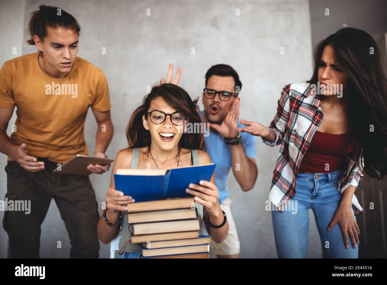 Ready to study hard. Happy nerd woman in library. Book lover Stock ...