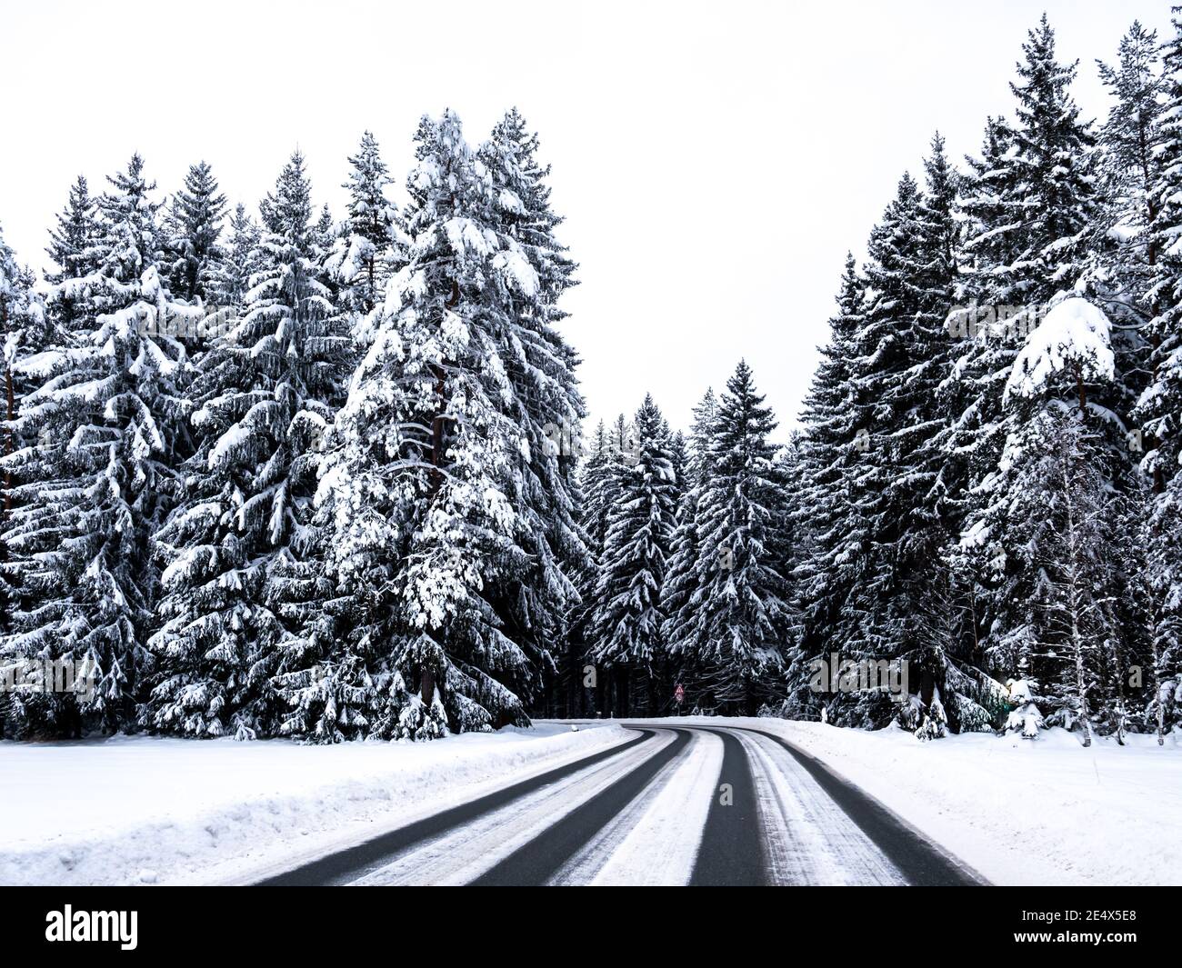 snow covered road in a winter landscape Stock Photo - Alamy