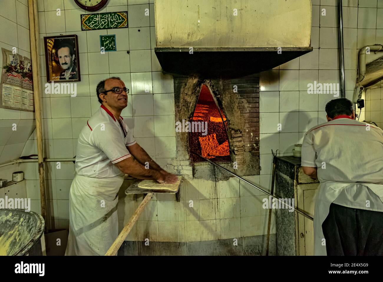 Bakers working, Bakery in Kashan bazaar, Kashan, Iran Stock Photo - Alamy