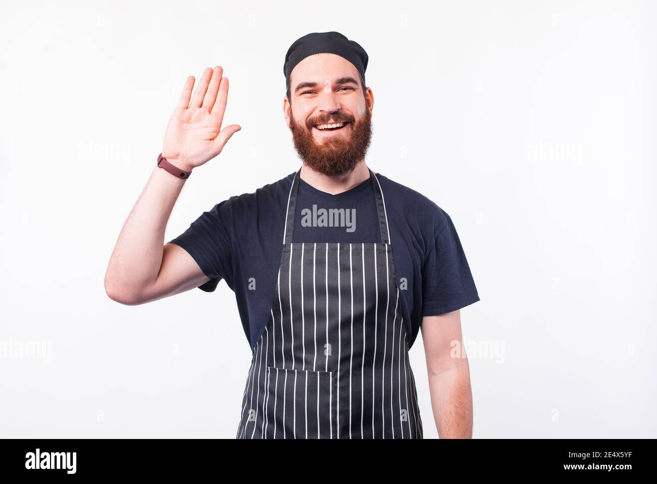 Photo of chef man saying HELLO gesture over white background Stock ...