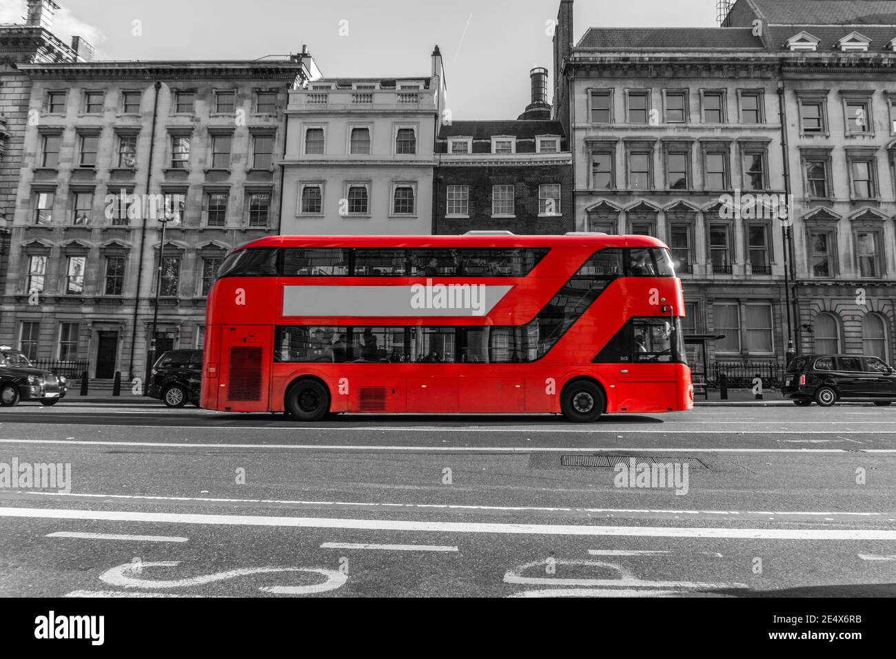 RED Double Decker Bus driving down city street - Red Color in Black and ...