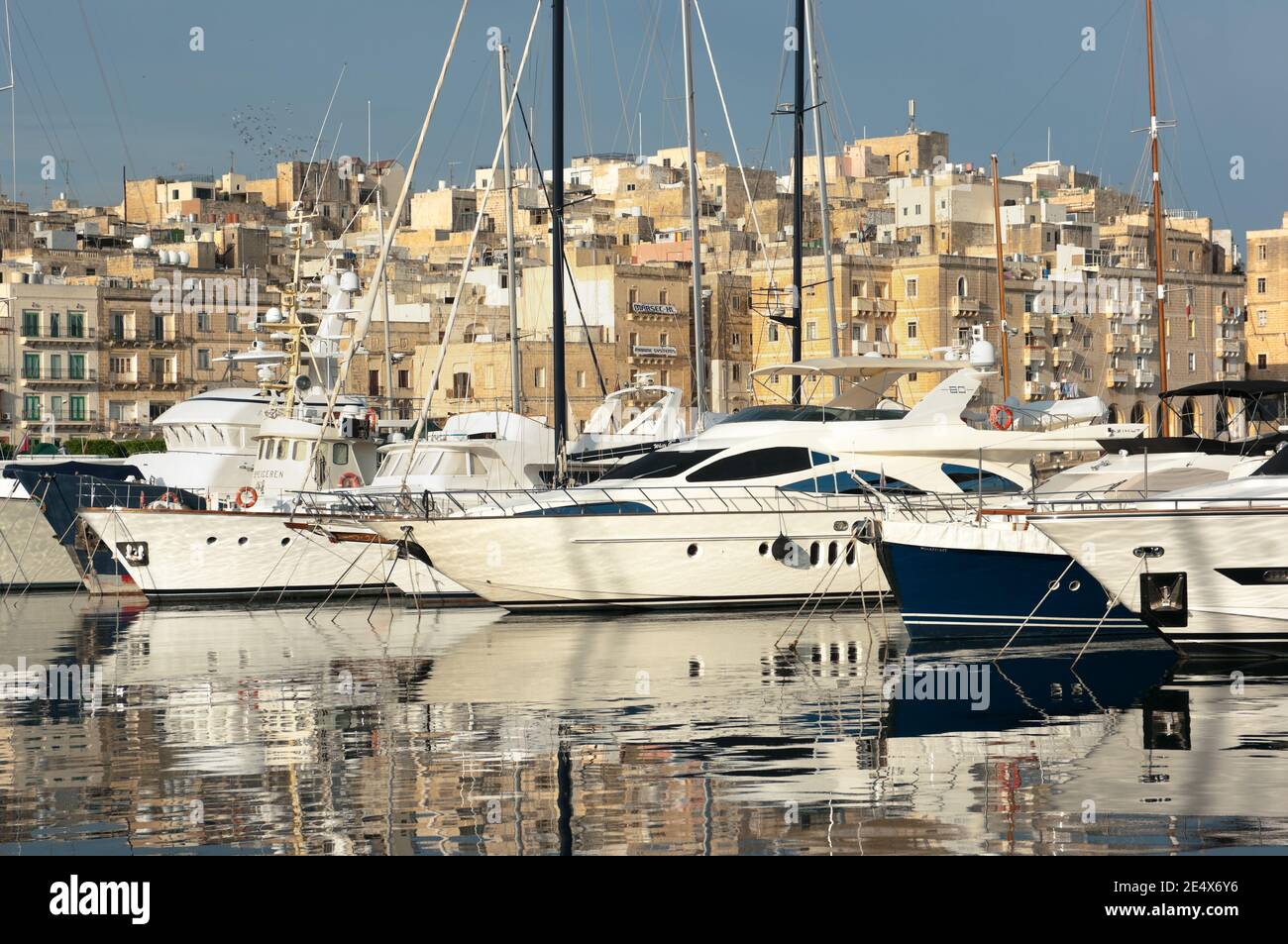 luxury sailing yachts moored in the marina of Senglea Old Town, Malta ...