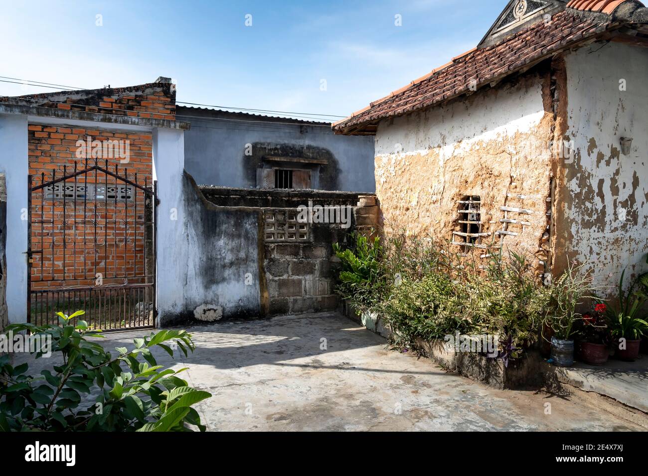 This is a traditional house in rural Vietnam. It had tiled roofs, clay ...
