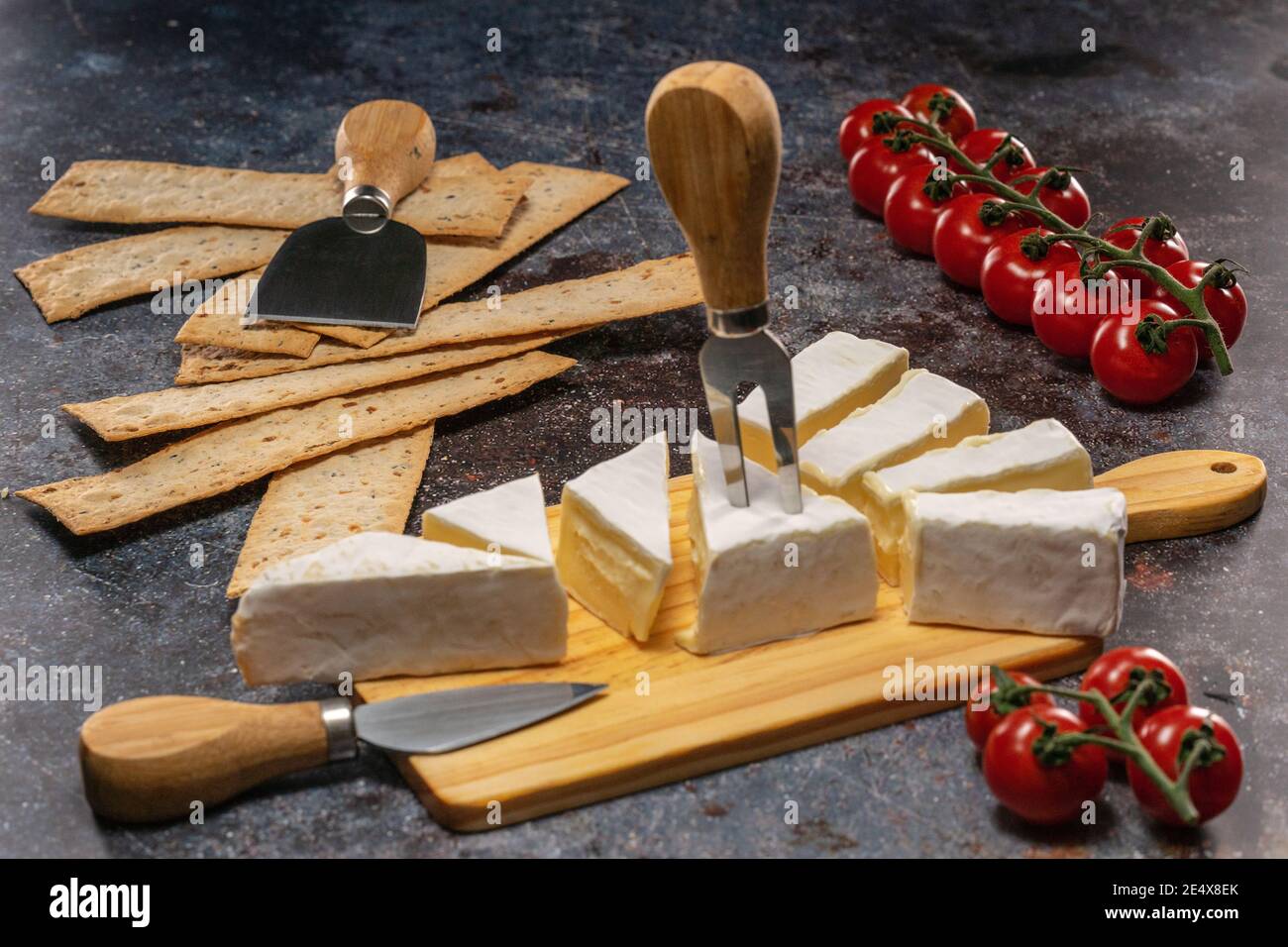 Cut brie cheese lying hi-res stock photography and images - Alamy