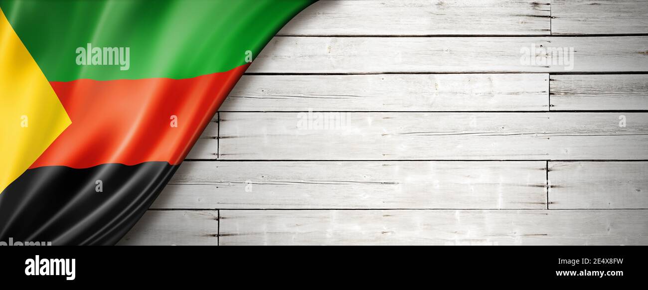 Azawad MNLA flag on old white wall. Horizontal panoramic banner Stock ...