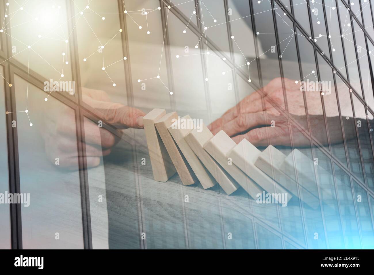 Business control concept by stopping domino effect; multiple exposure ...