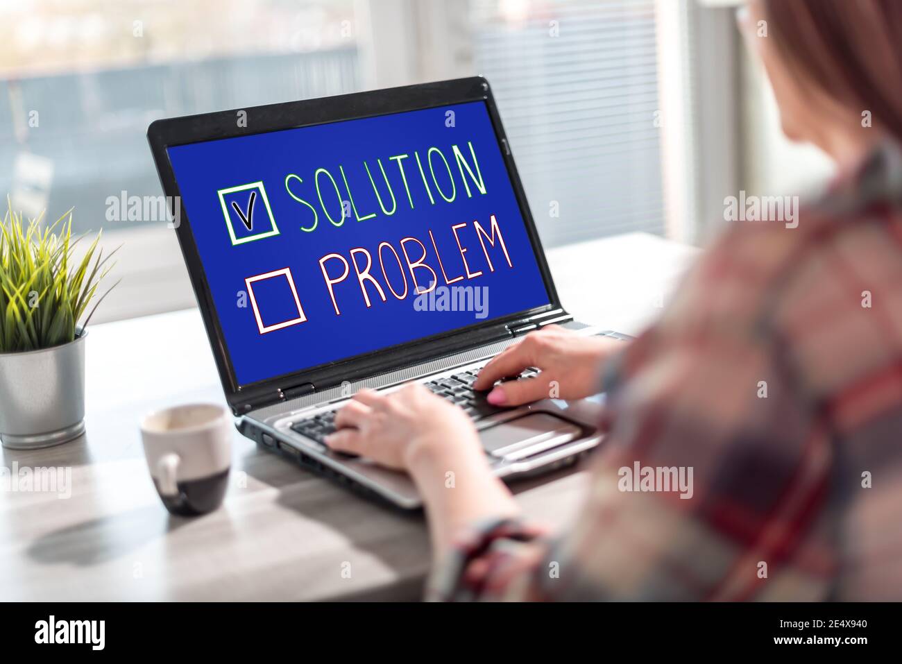 Laptop screen displaying a solution concept Stock Photo - Alamy
