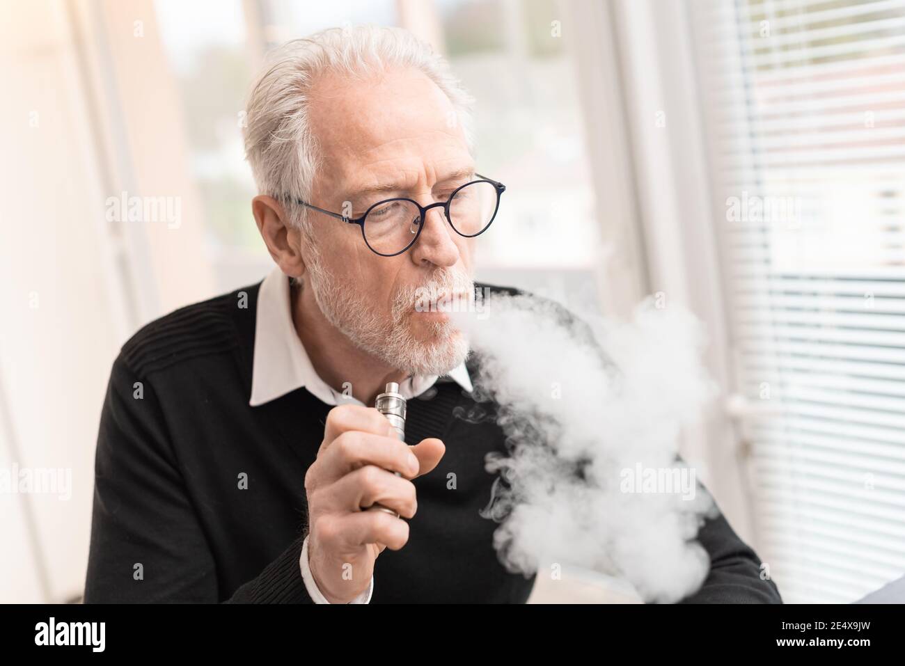 Old man vaping hi-res stock photography and images - Alamy