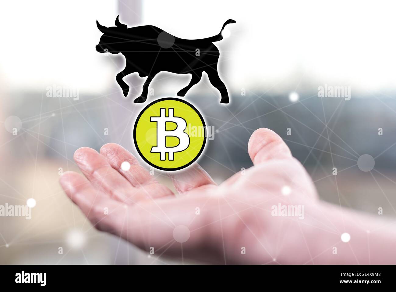 Bitcoin bullish trend concept above a hand of a man Stock Photo - Alamy