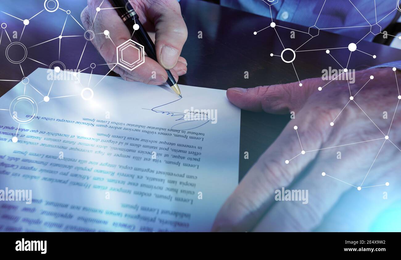 Human hand signing a contract; light effect Stock Photo - Alamy