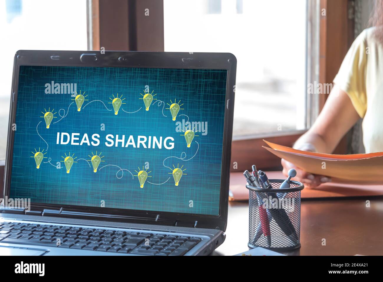 Laptop screen displaying an ideas sharing concept Stock Photo - Alamy