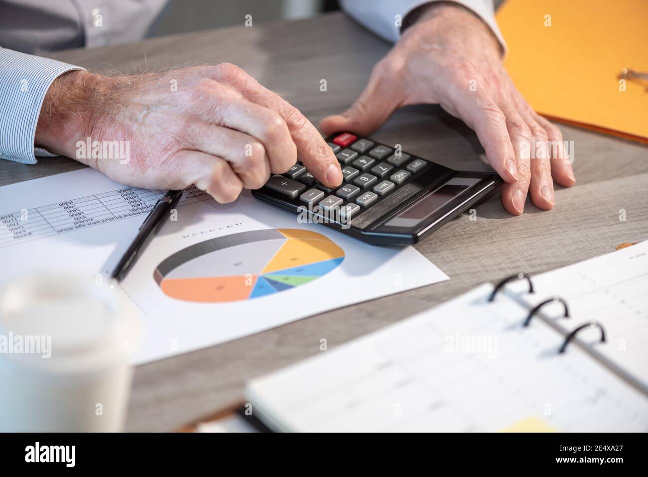 Data analysing hand calculator hi-res stock photography and images - Alamy