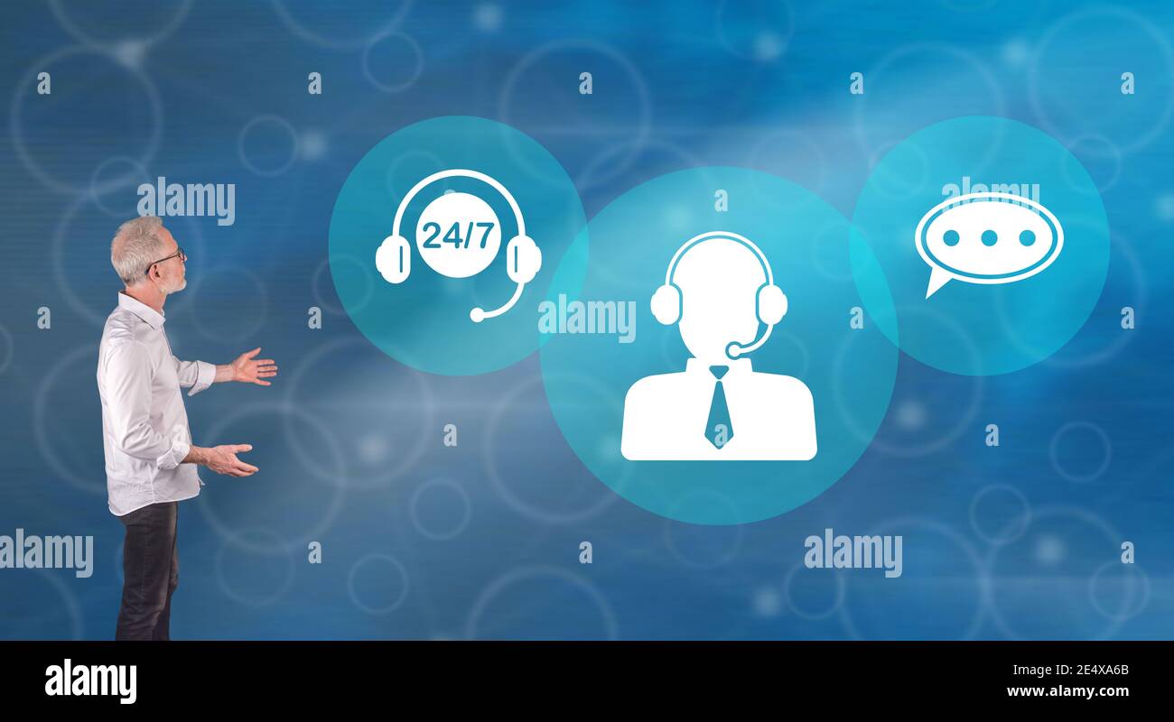 Businessman showing a call center concept on a wall screen Stock Photo ...