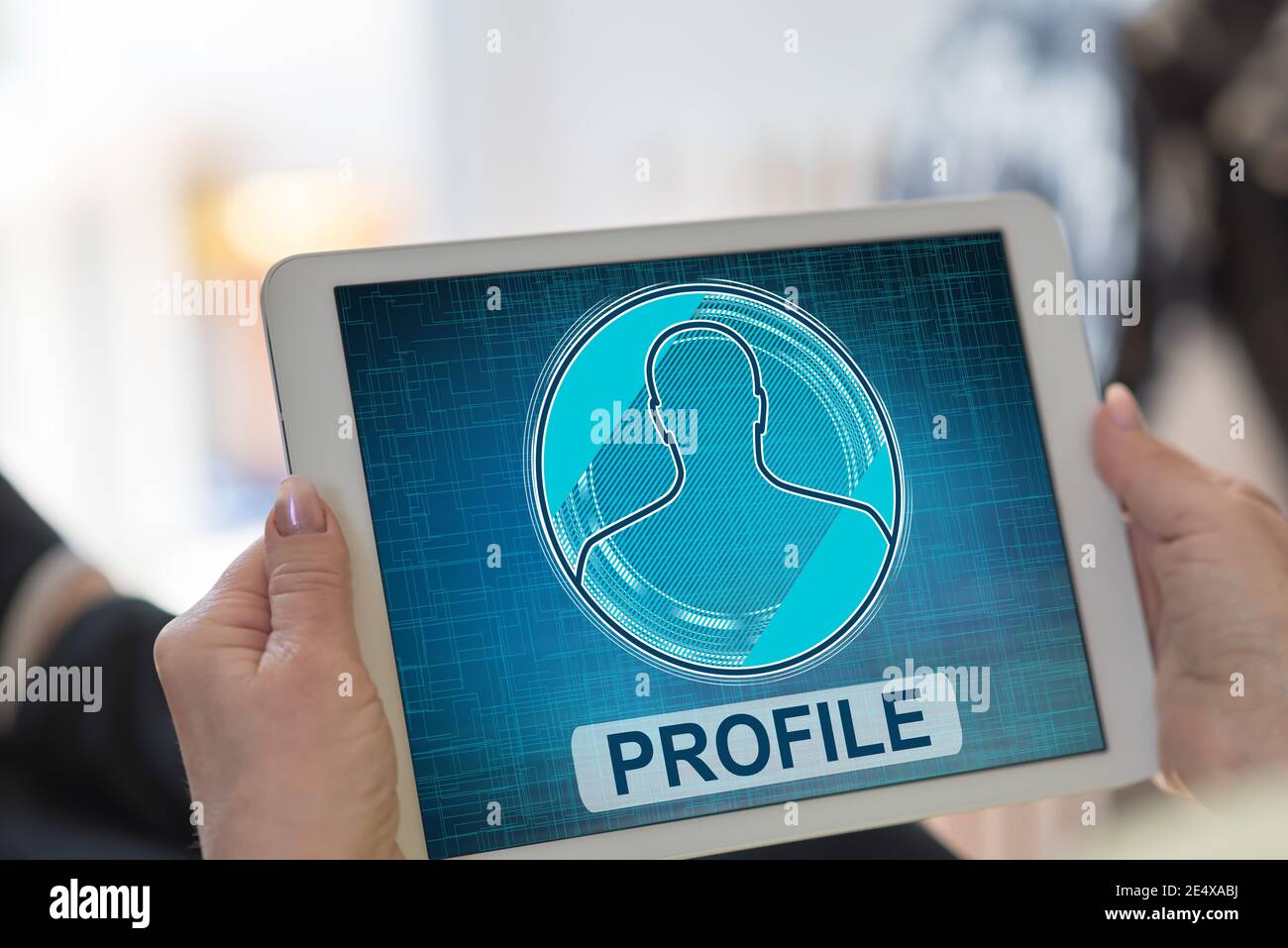 Tablet screen displaying a profile concept Stock Photo - Alamy