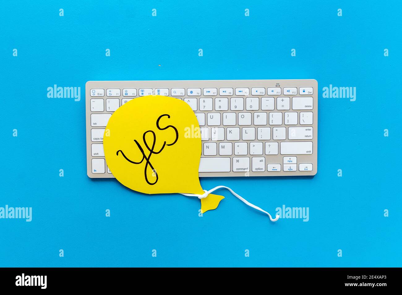 Yes agreement - decision concept. Word Yes on the keyboard, top view ...