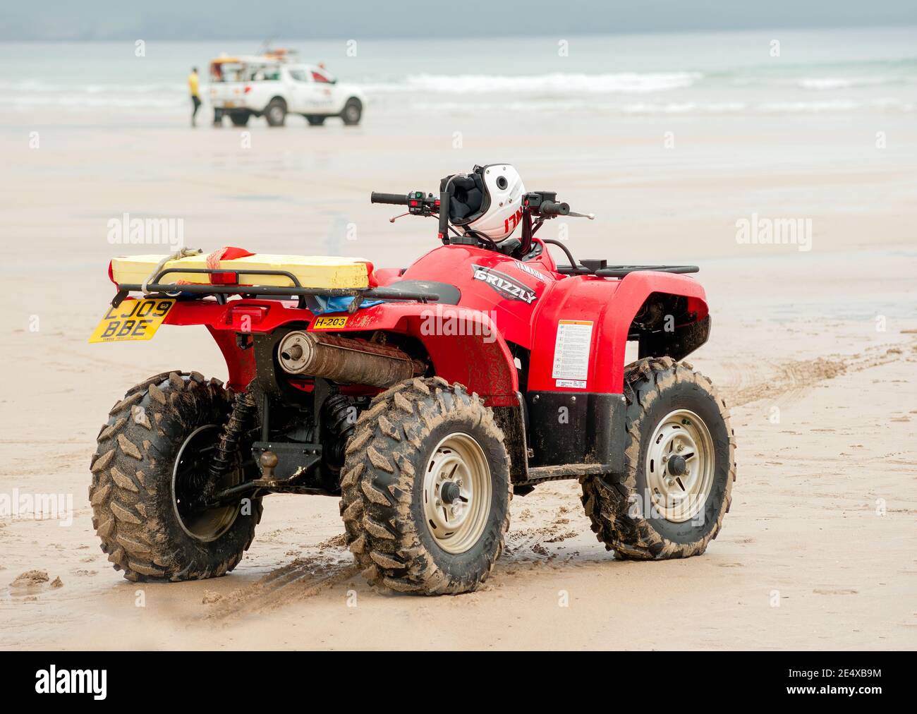 PENZANCE, CORNWALL, UK - JUNE 12, 2009: RNLI quad bike on beach with ...