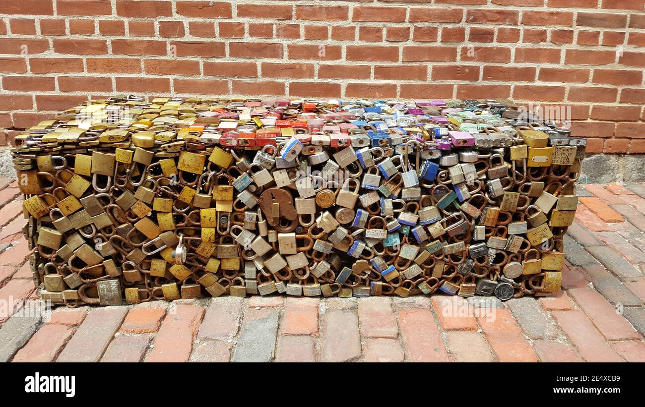TORONT, CANADA - Jul 01, 2017: Different coloured lock bench sitting on ...