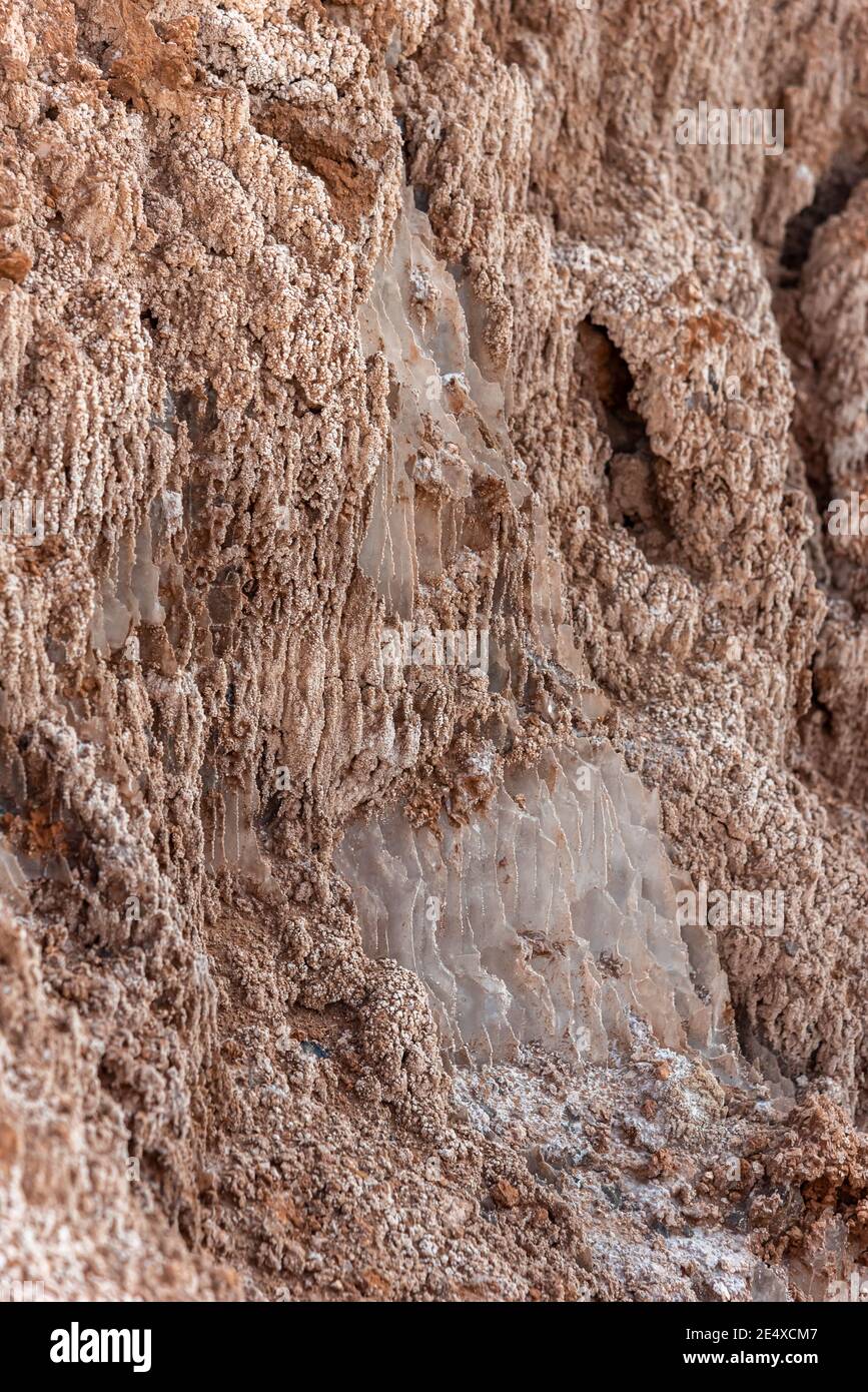 Surface of rough wall of rocky cliff located in arid Atacama Desert ...