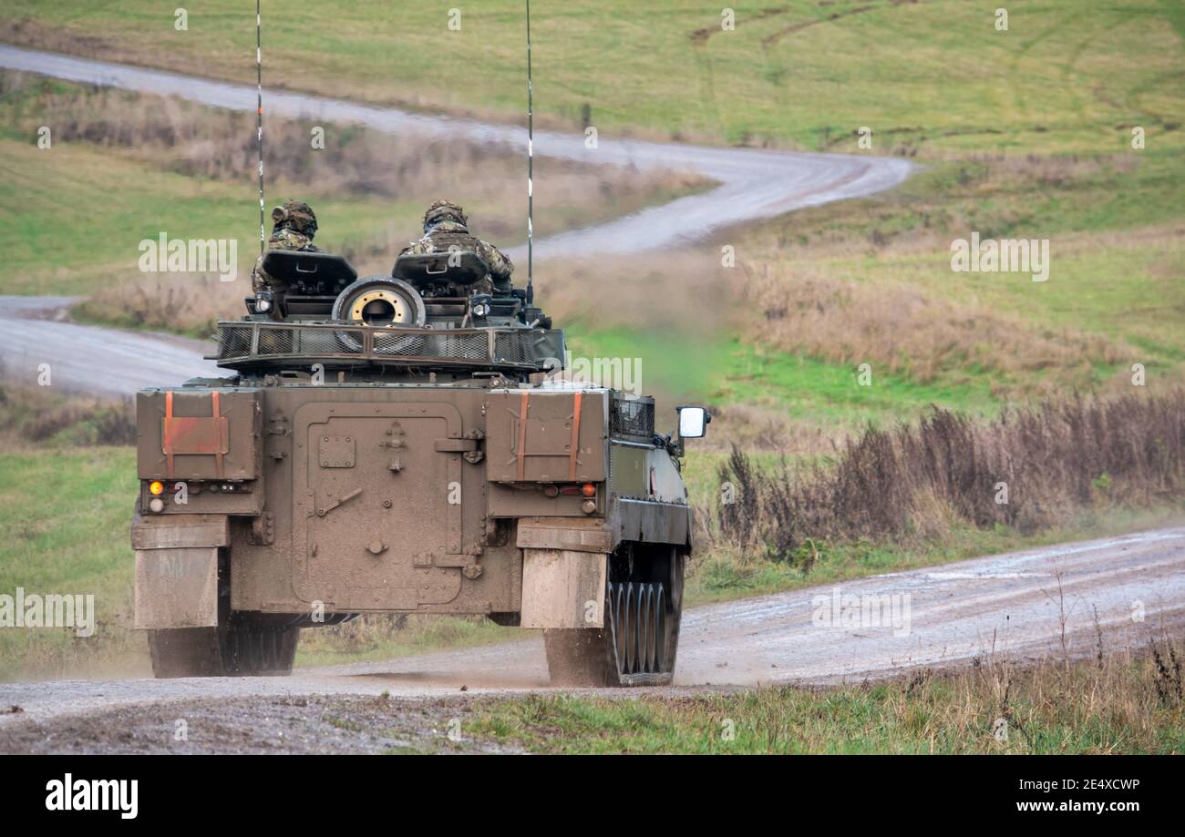 british army warrior tracked armoured vehicle on maneuvers in a show of ...