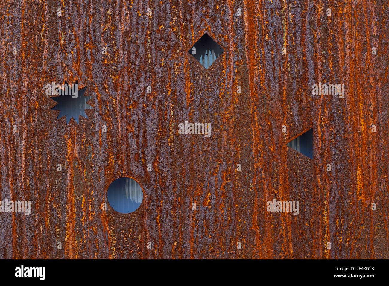 Rusty metal with cuts and traces of corrosion and rust, texture ...