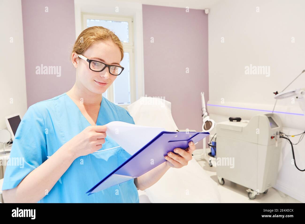 Surgical nurse or doctor with checklist in the doctor's office or in ...