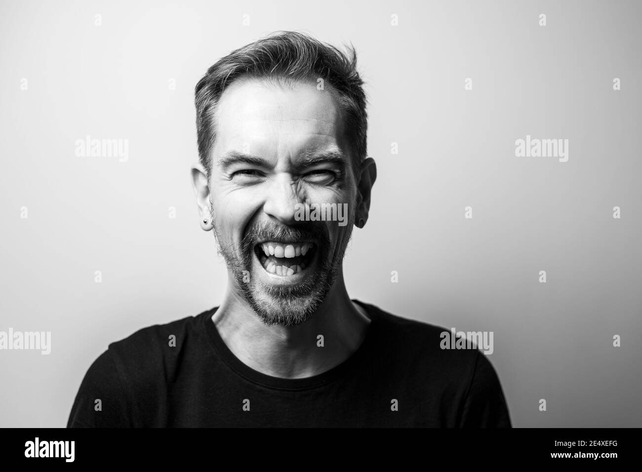 Portrait of a mad man. Black and white Stock Photo - Alamy