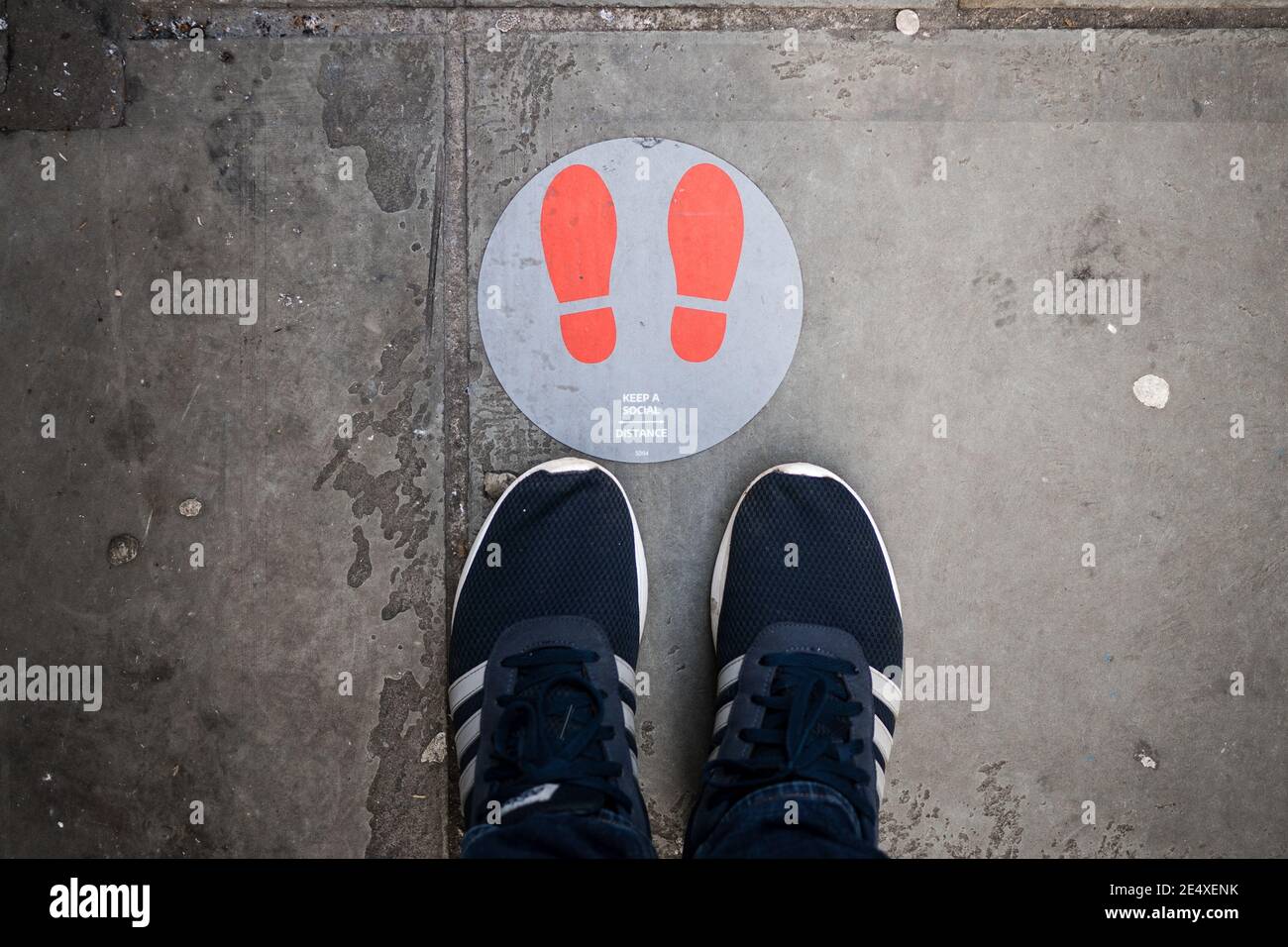 Stood over Covid 19 restrictions sign stay two meters apart social ...