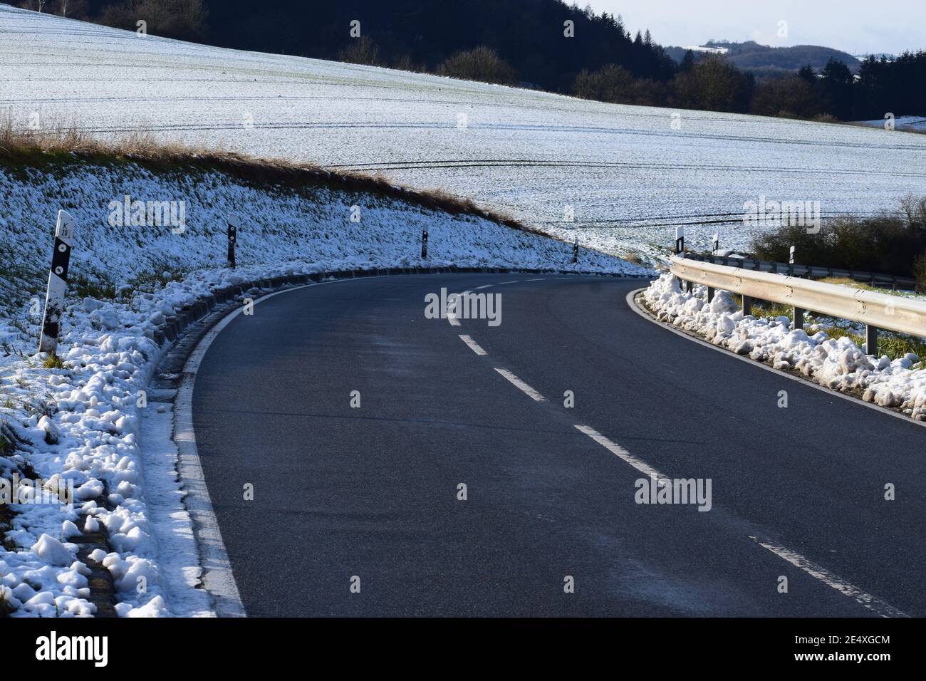 Roadside cross in snow landscape hi-res stock photography and images ...