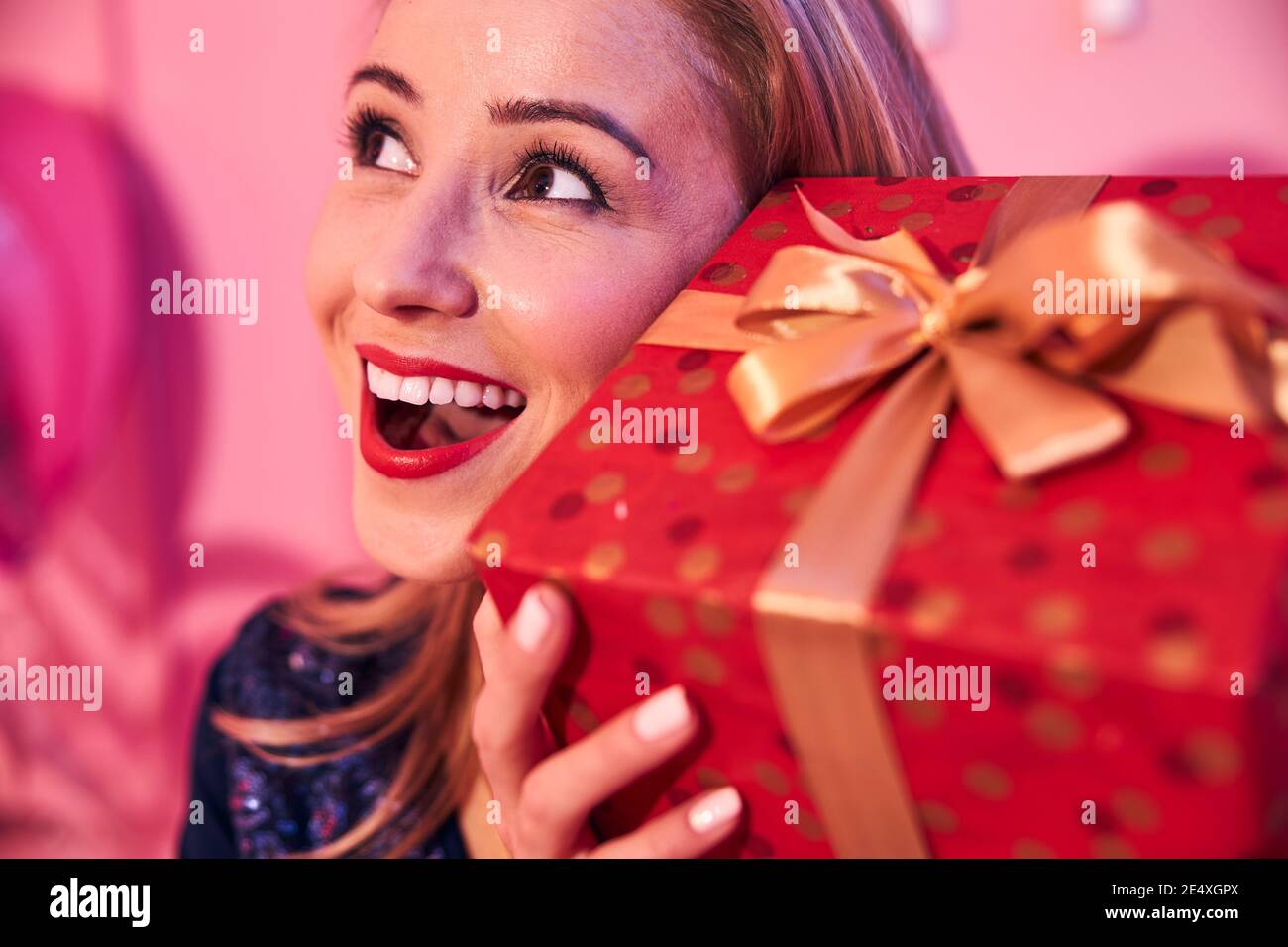 Blonde looking gift box hi-res stock photography and images - Alamy