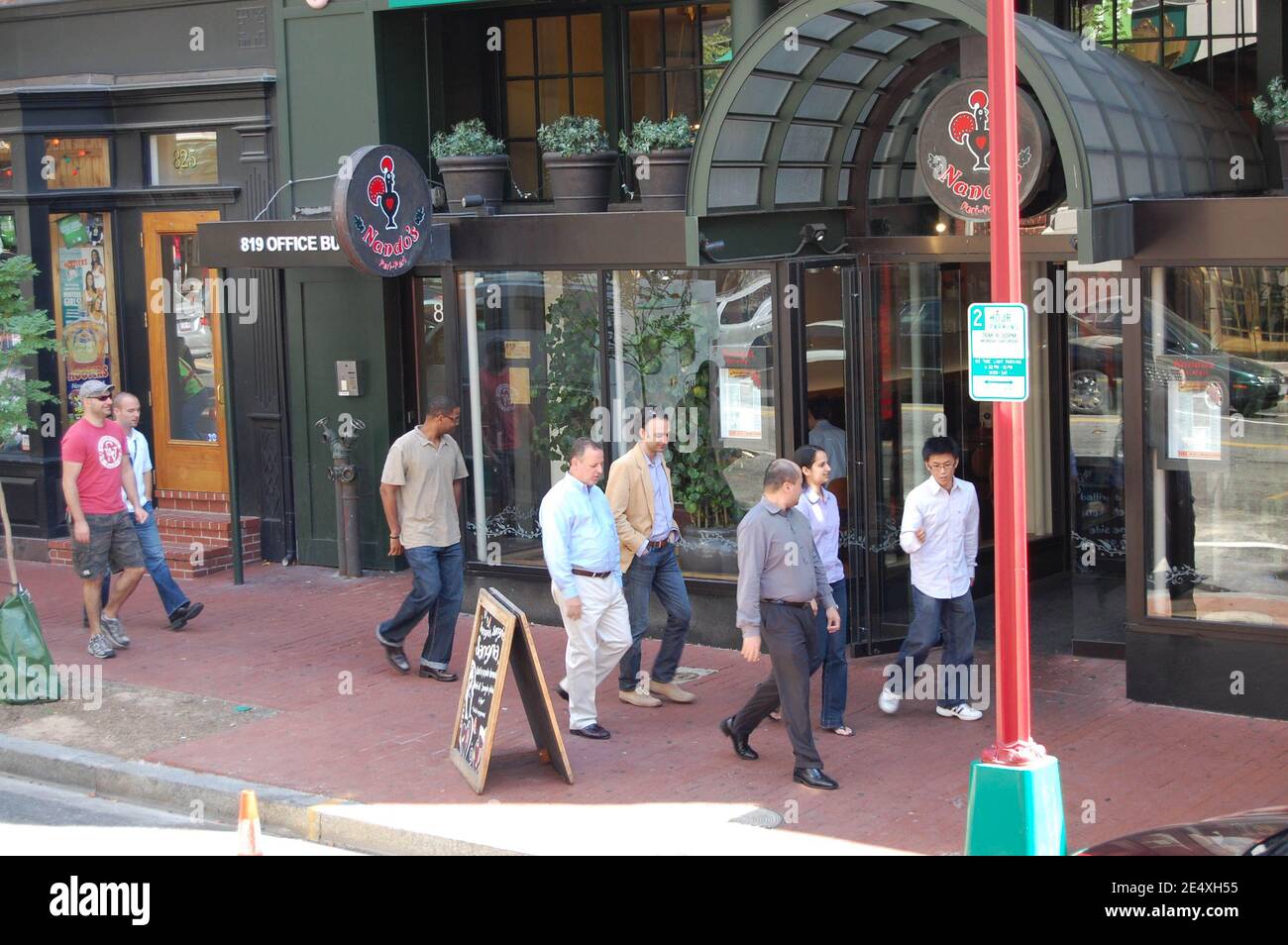 Nandos Washington USA sign people walking outside food eat store ...