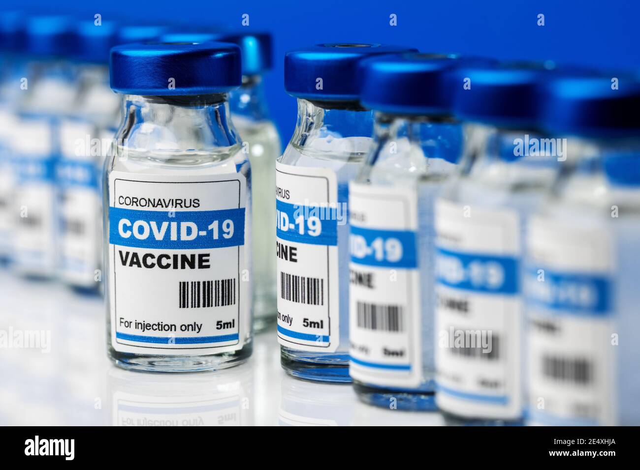 covid-19 vaccine - coronavirus vaccination bottles in a line. injection ...