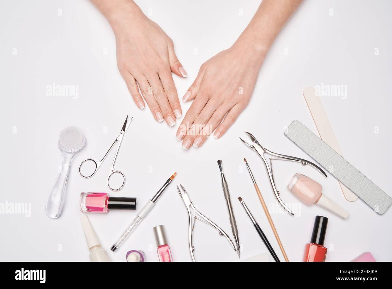 top view of manicure tools set for nail care over light background ...