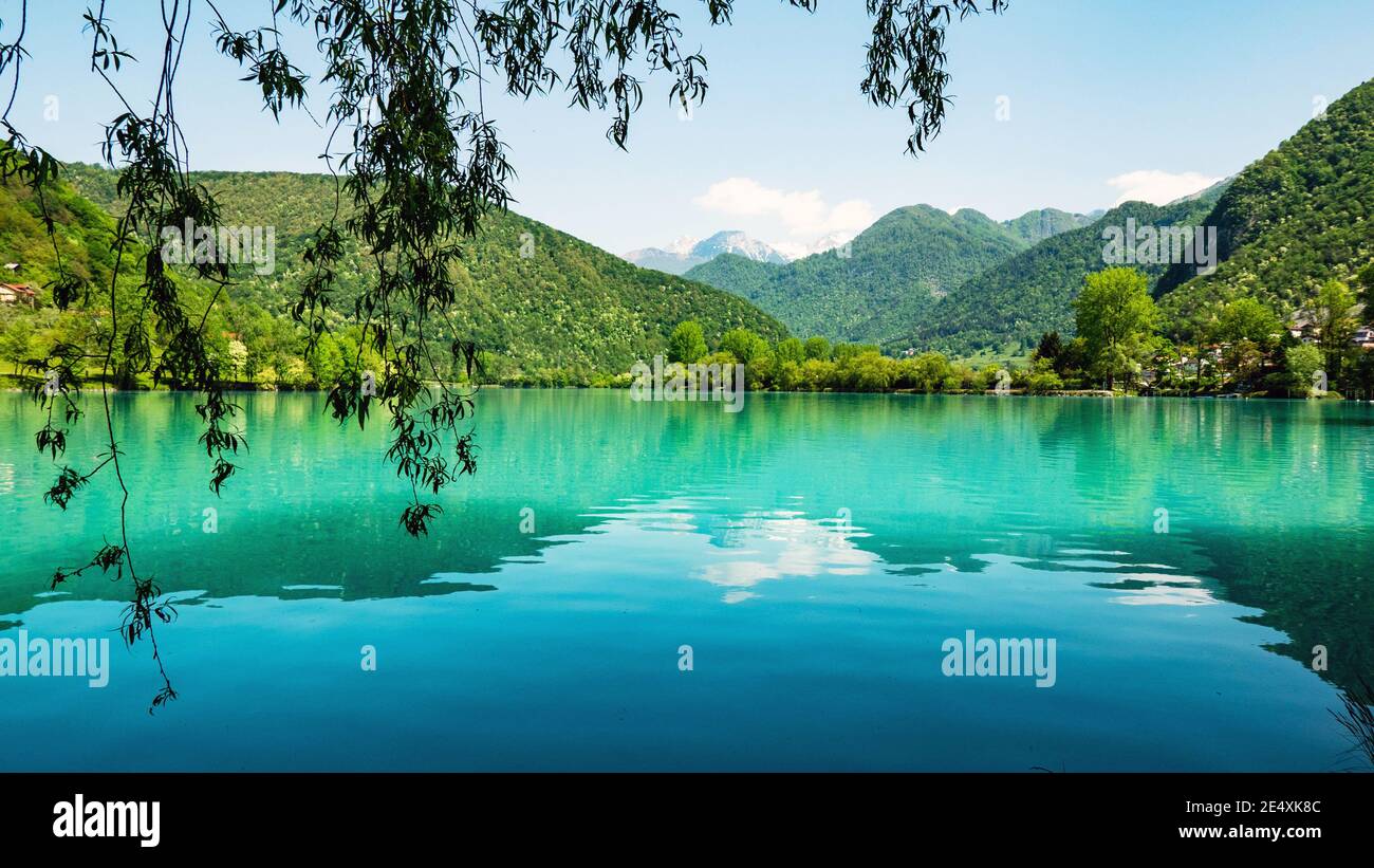 Emerald green lake surrounded by hills and mountains. Most na Soci ...