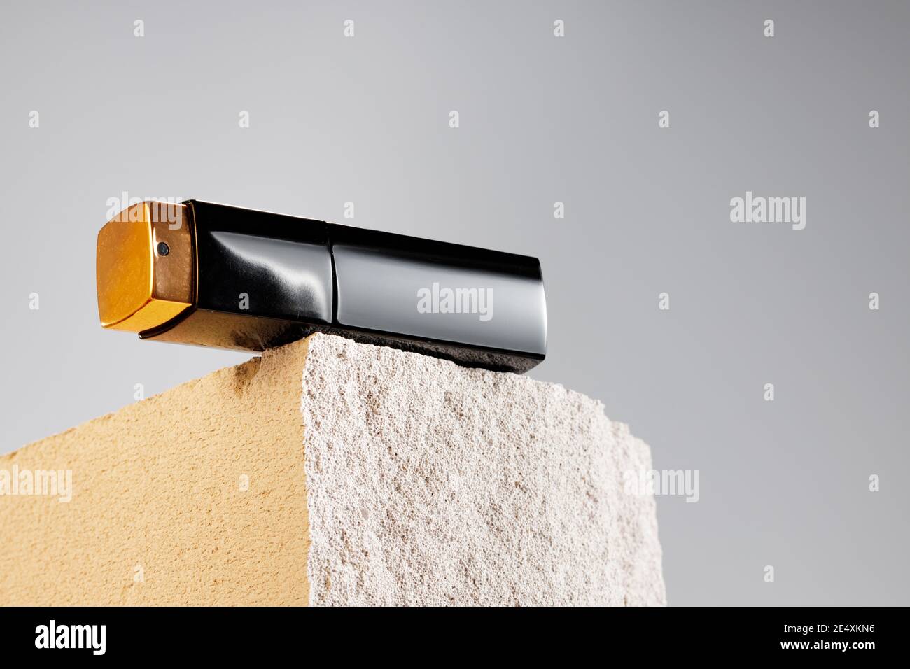 Cosmetic jar on gray cinder block close up Stock Photo - Alamy