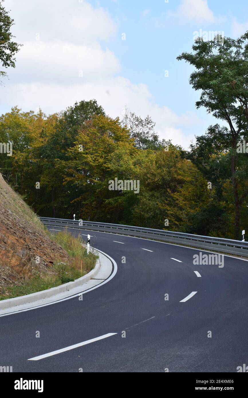 road curve in autumn Stock Photo - Alamy