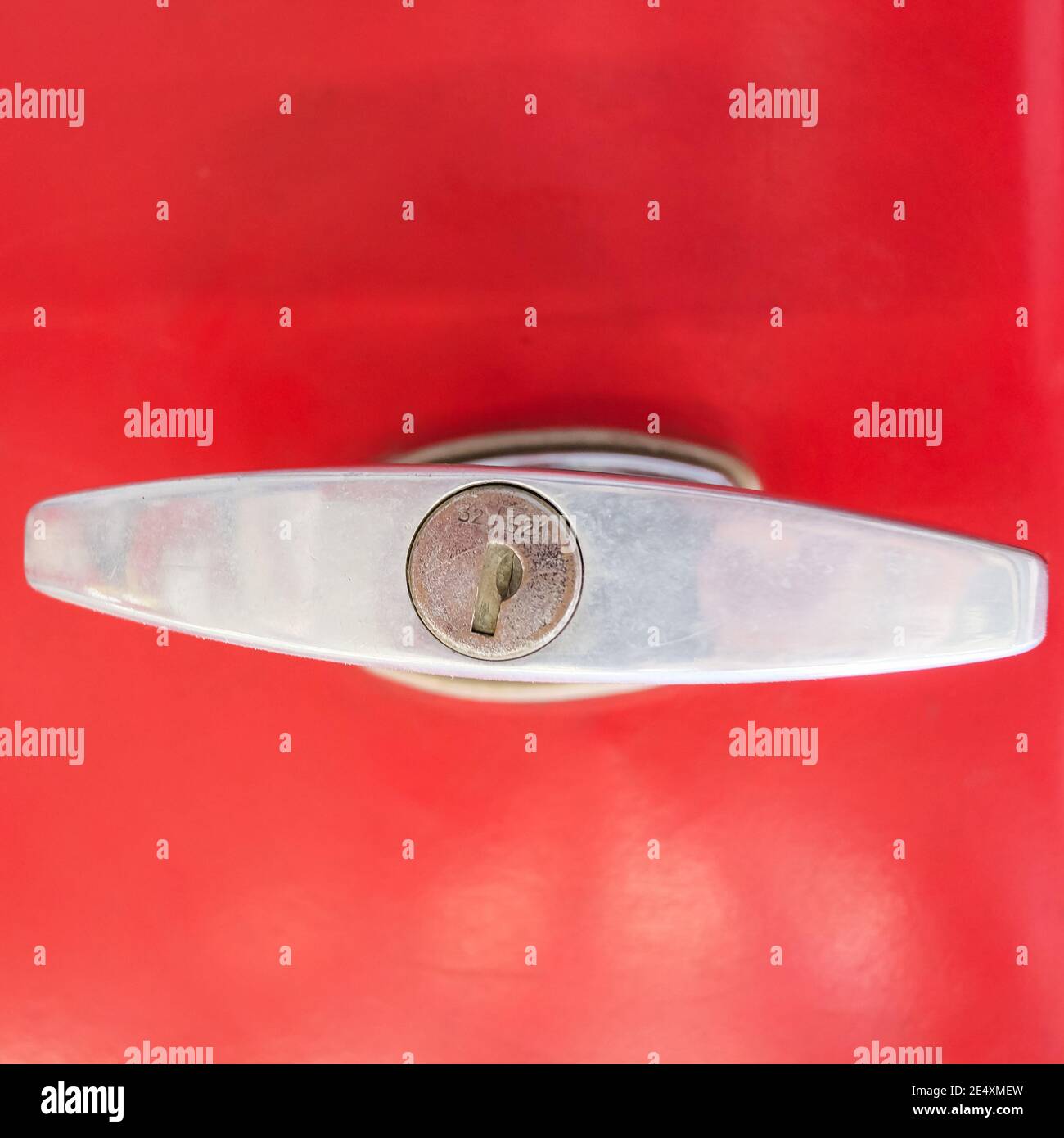A twist handle with a security lock Stock Photo - Alamy