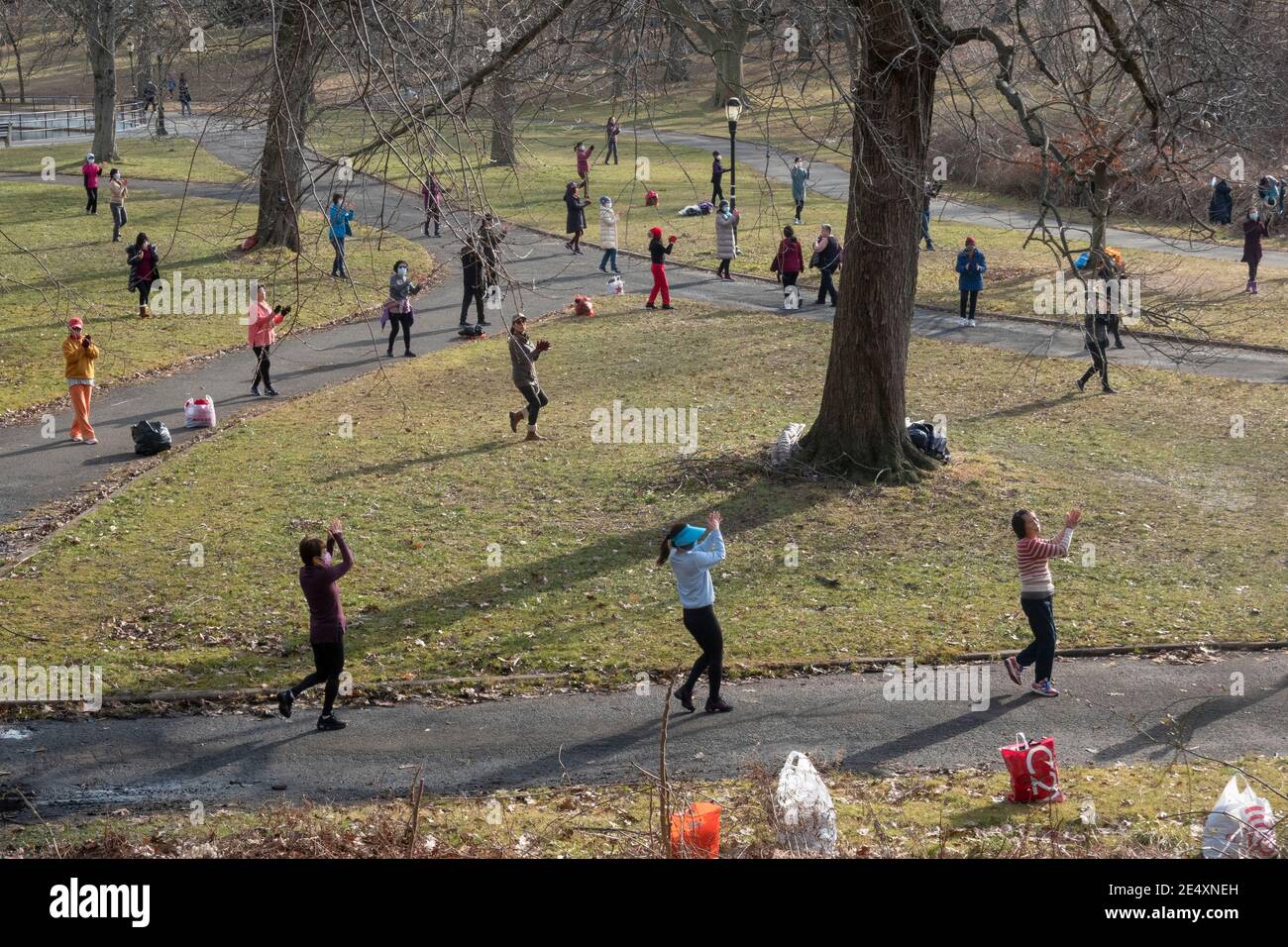 A large group of primarily Chinese American women participate in an ...